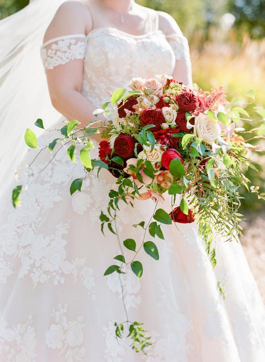 A Bold Red Wedding Complete with an Explosion of Flowers and a 24-Ft ...