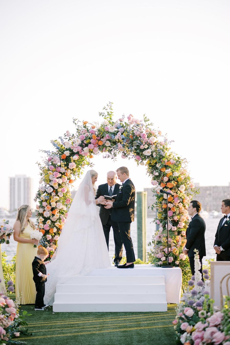 A Whimsical Waterfront Wedding Awash in Bright Color, Rattan Accents ...