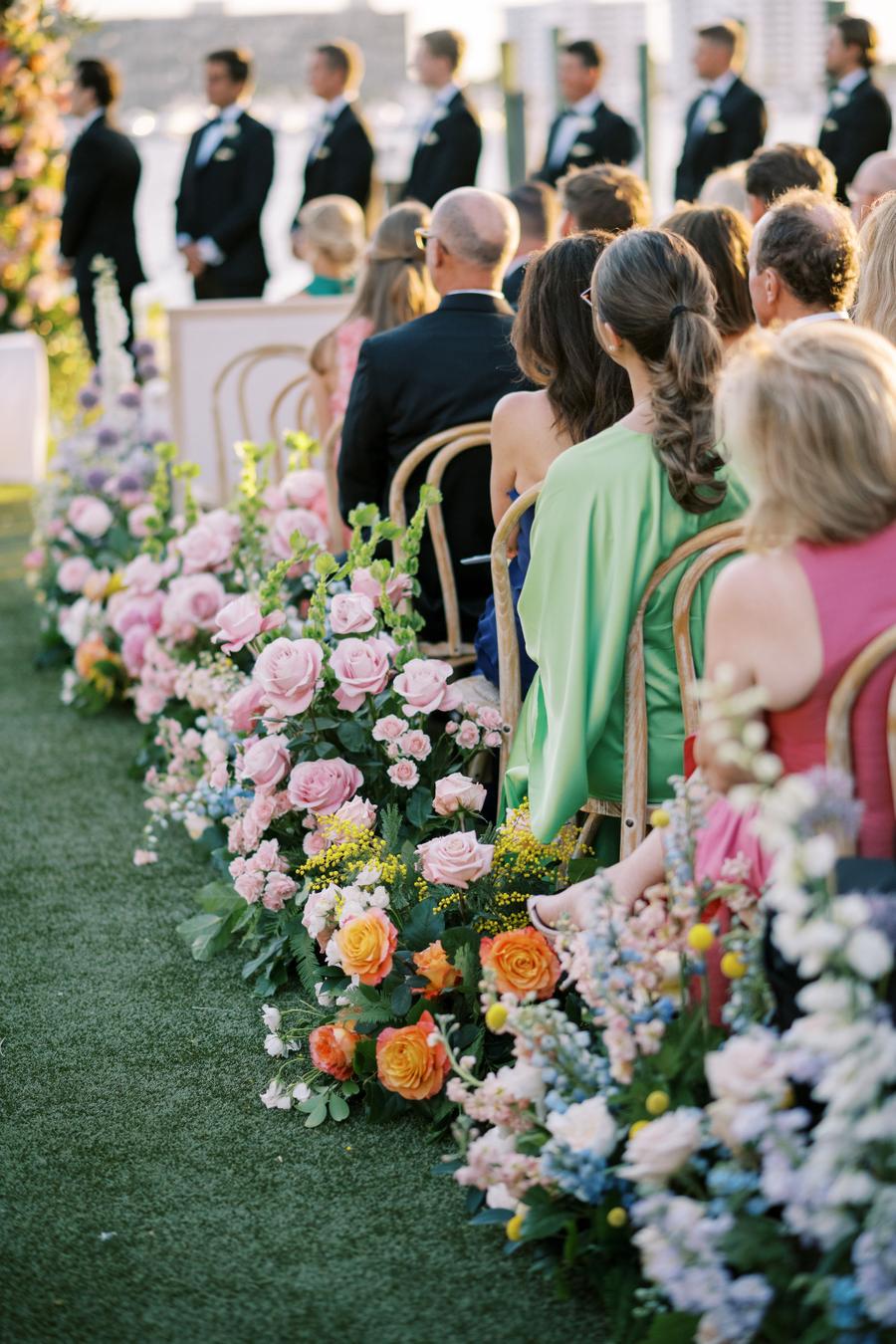 A Whimsical Waterfront Wedding Awash in Bright Color, Rattan Accents ...