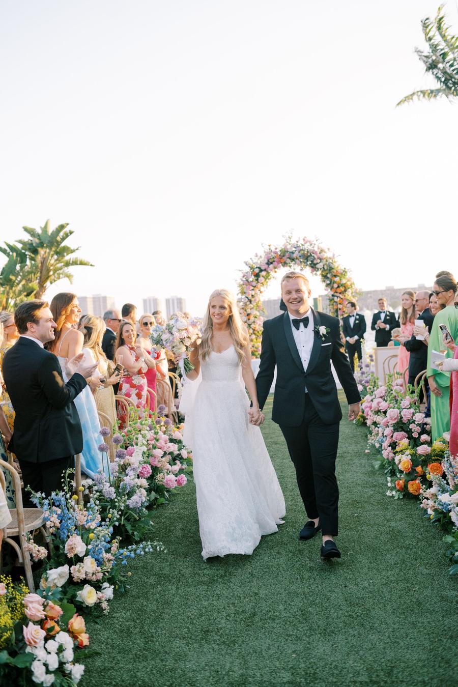 A Whimsical Waterfront Wedding Awash in Bright Color, Rattan Accents ...