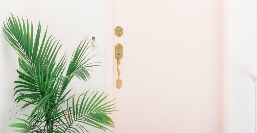 Ring the Pineapple Doorbell on This Blushing Pink Cottage